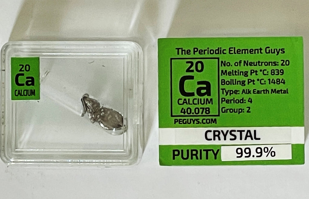 Calcium Metal Crystal 99.9% in oil in glass ampoule in a Periodic ...